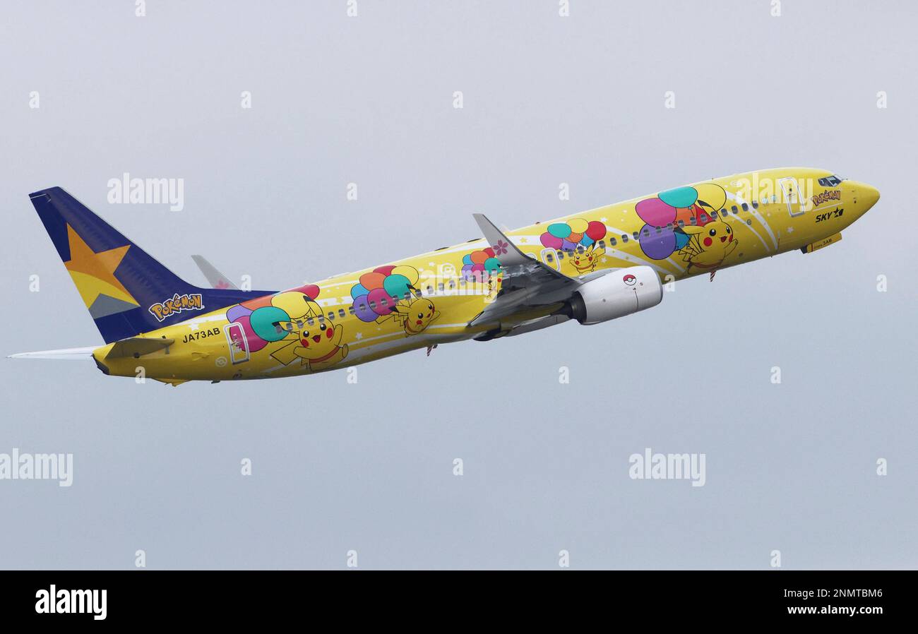 An airplane that is adorned with Pokémon, Pikachu Jet, flies in Tokyo ...