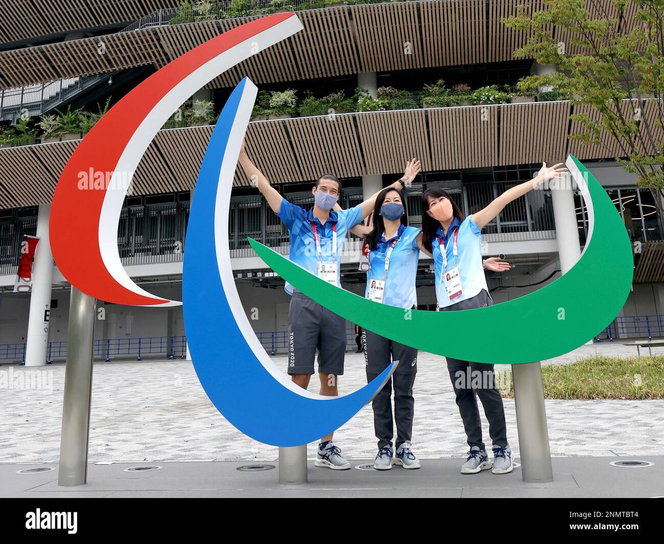The Paralympic symbols, three "agitos" (Latin for "I move") colored red ...