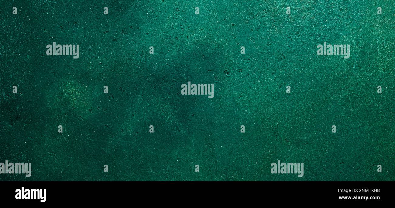 Matte green texture or background with stains and grain elements. Image ...