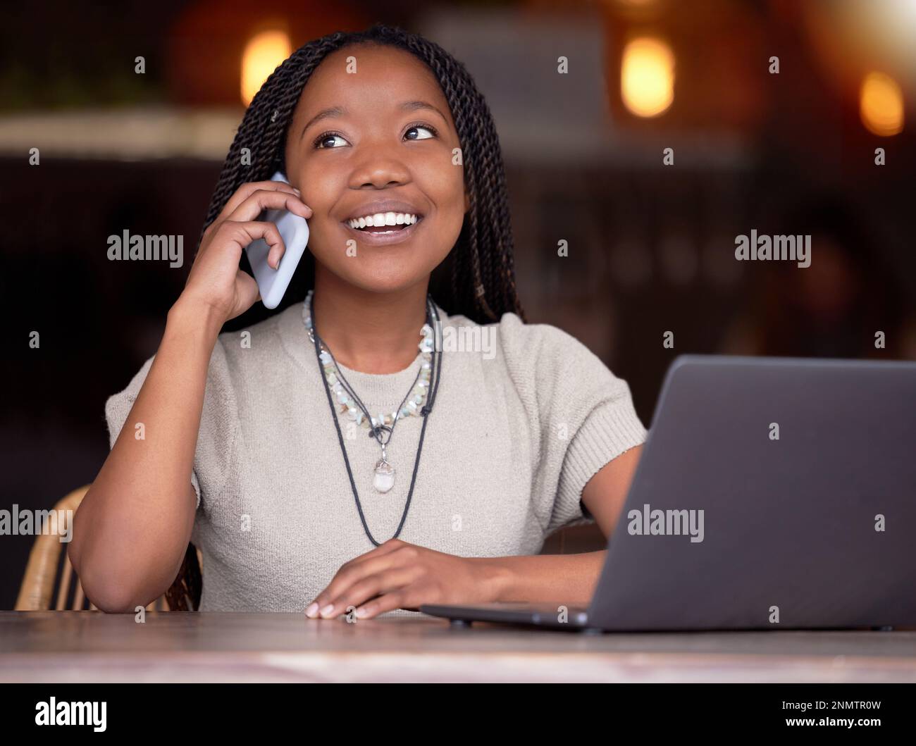 Black woman, phone call and laptop with smile at cafe for communication ...