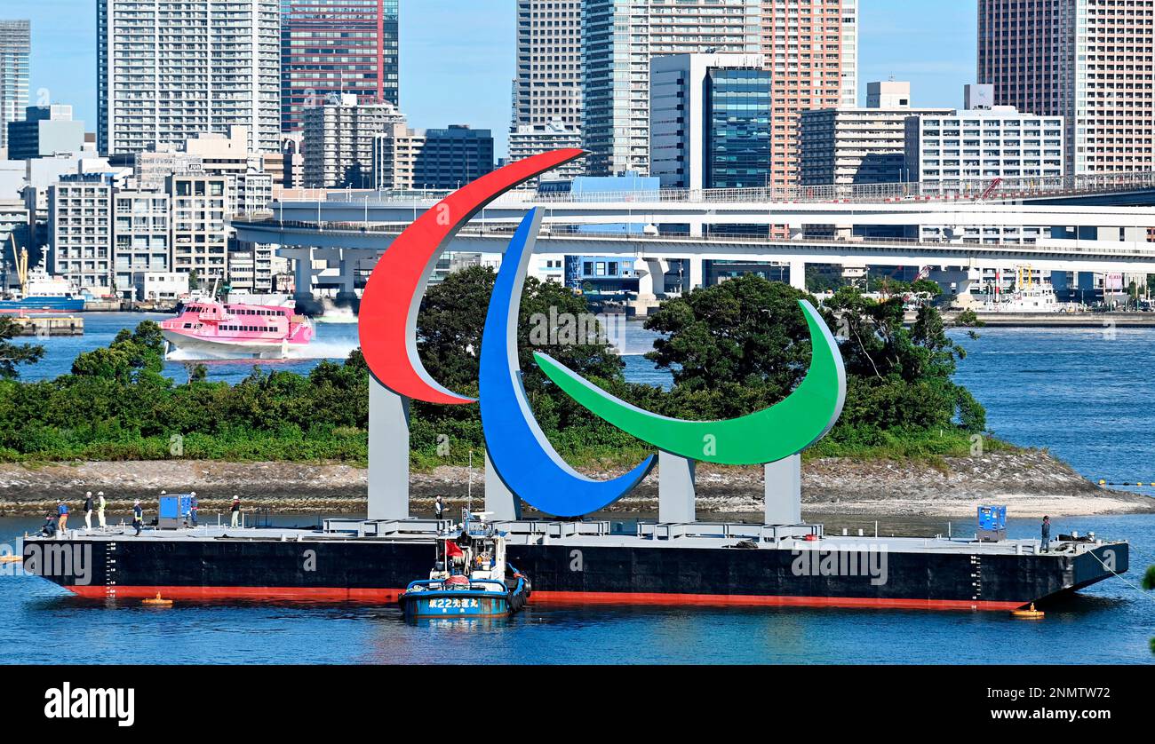 Paralympic symbol "Three Agitos" is set on the surface of the sea at ...