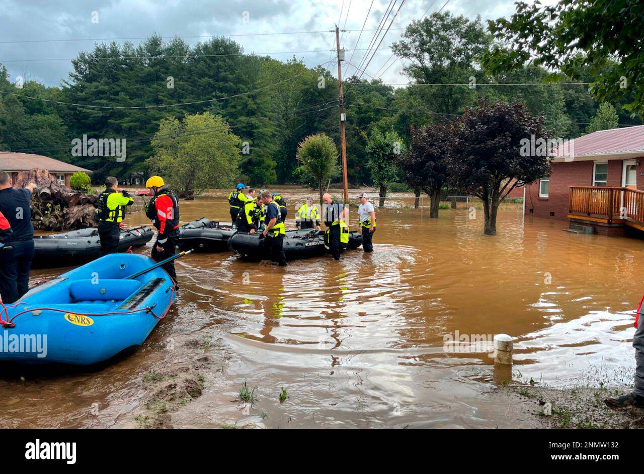 In this image provided by New Hanover County Fire Rescue, members of ...