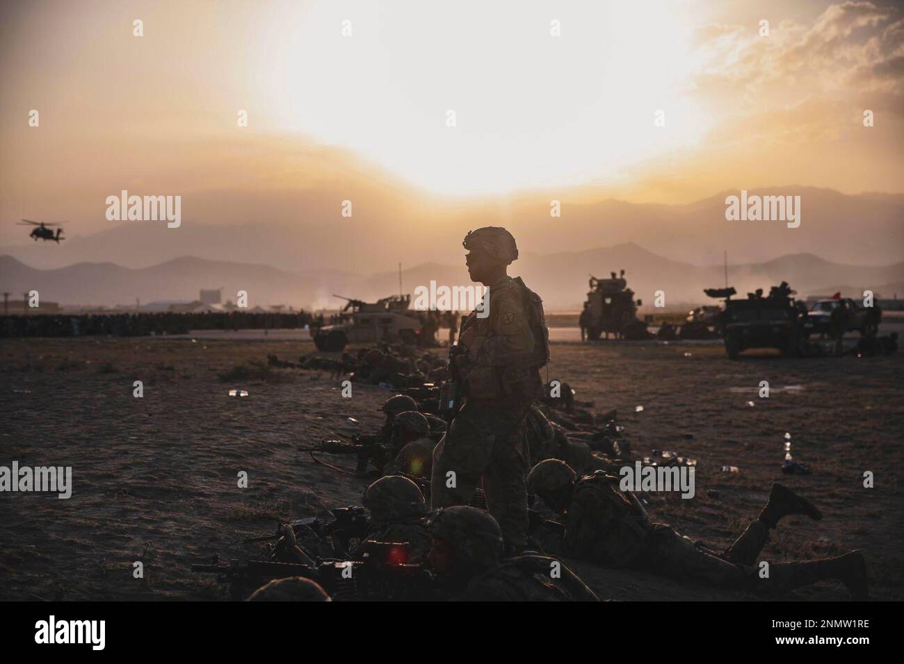 U.S. Army Soldiers assigned to the 10th Mountain Division stand ...