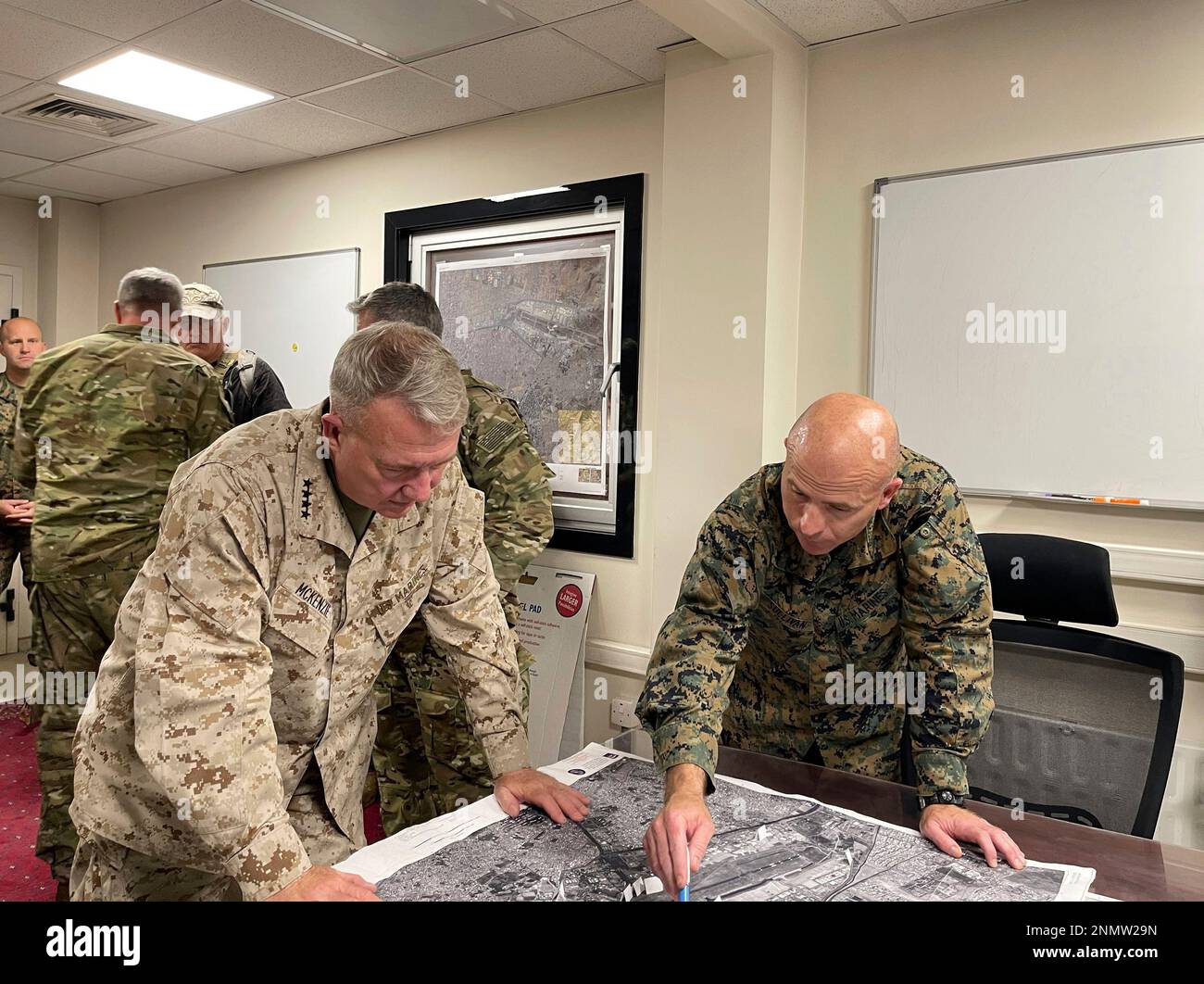 U.S. Marine Corps Gen. Frank McKenzie, center left, the commander of U ...