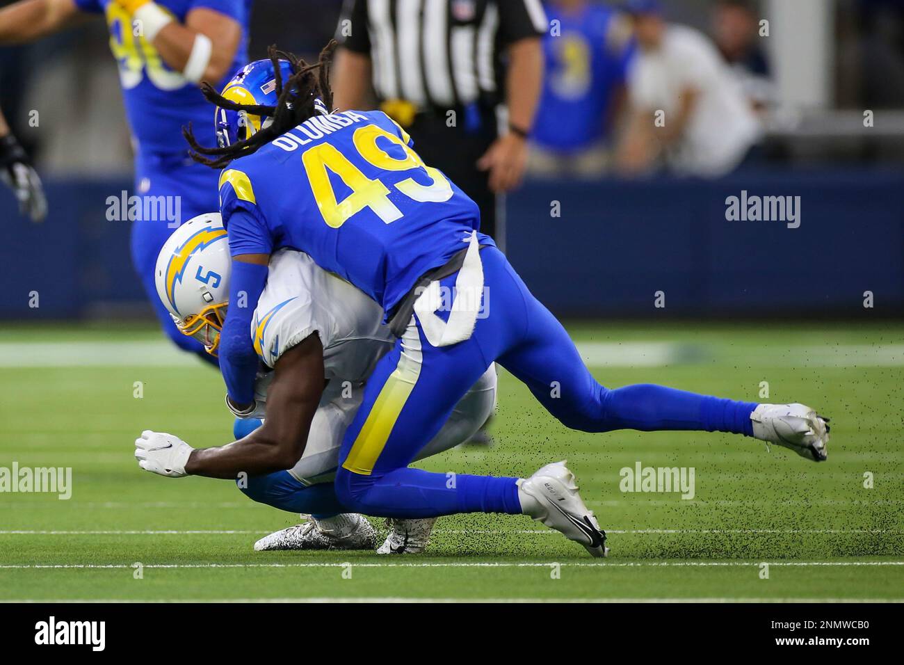 INGLEWOOD, CA - AUGUST 14: Los Angeles Rams Donovan Olumba tackles Los ...