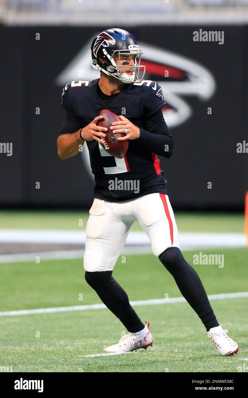 ATLANTA, GA - AUGUST 13: AJ McCarron (5) of the Atlanta Falcons drops ...