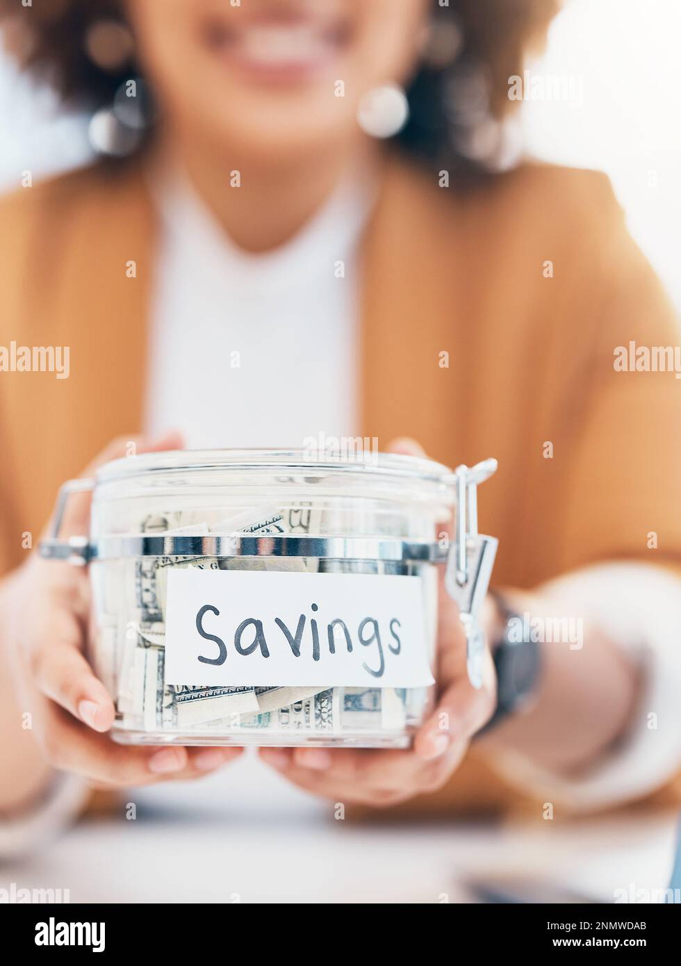 Closeup, cash and savings with black woman, jar and finance for future ...