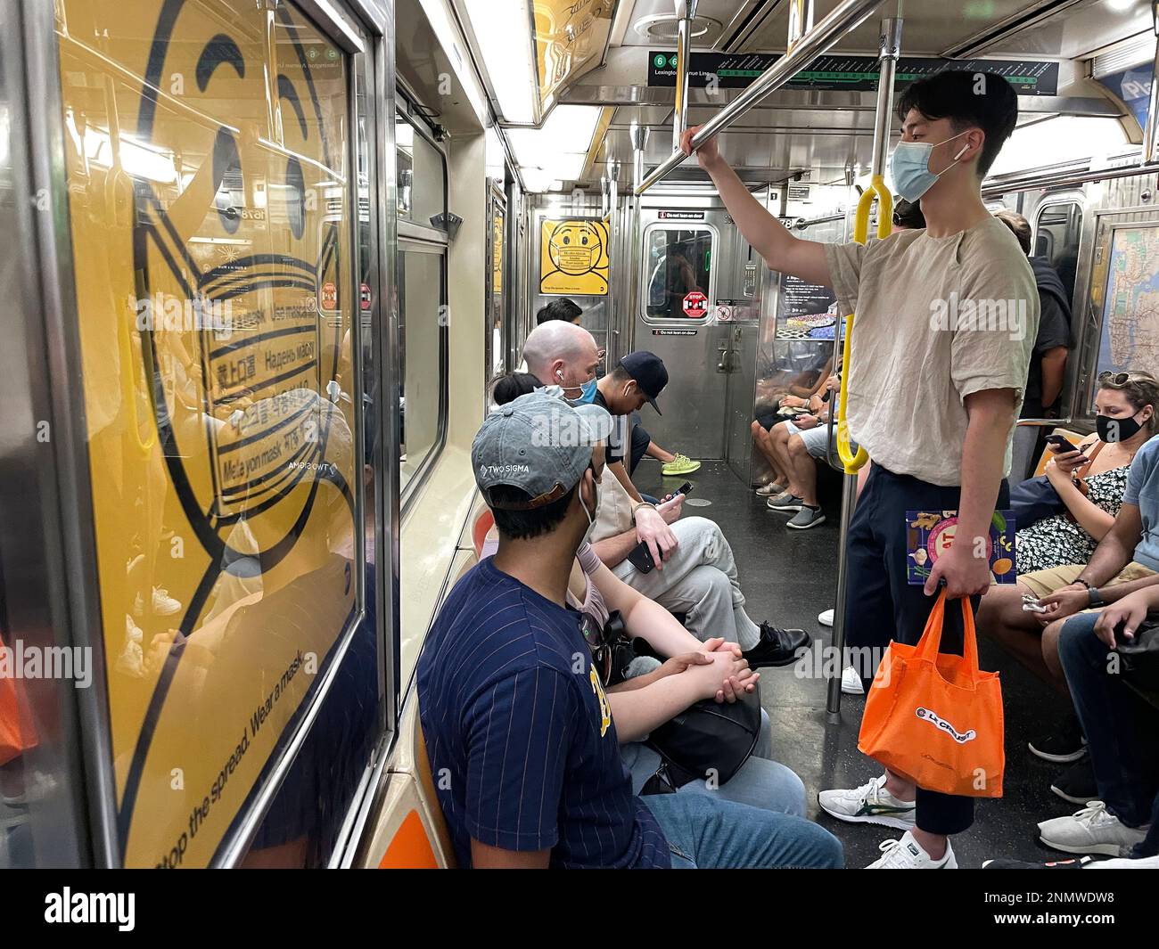 Photo by: STRF/STAR MAX/IPx 2021 8/14/21 COVID-19 posters surround ...
