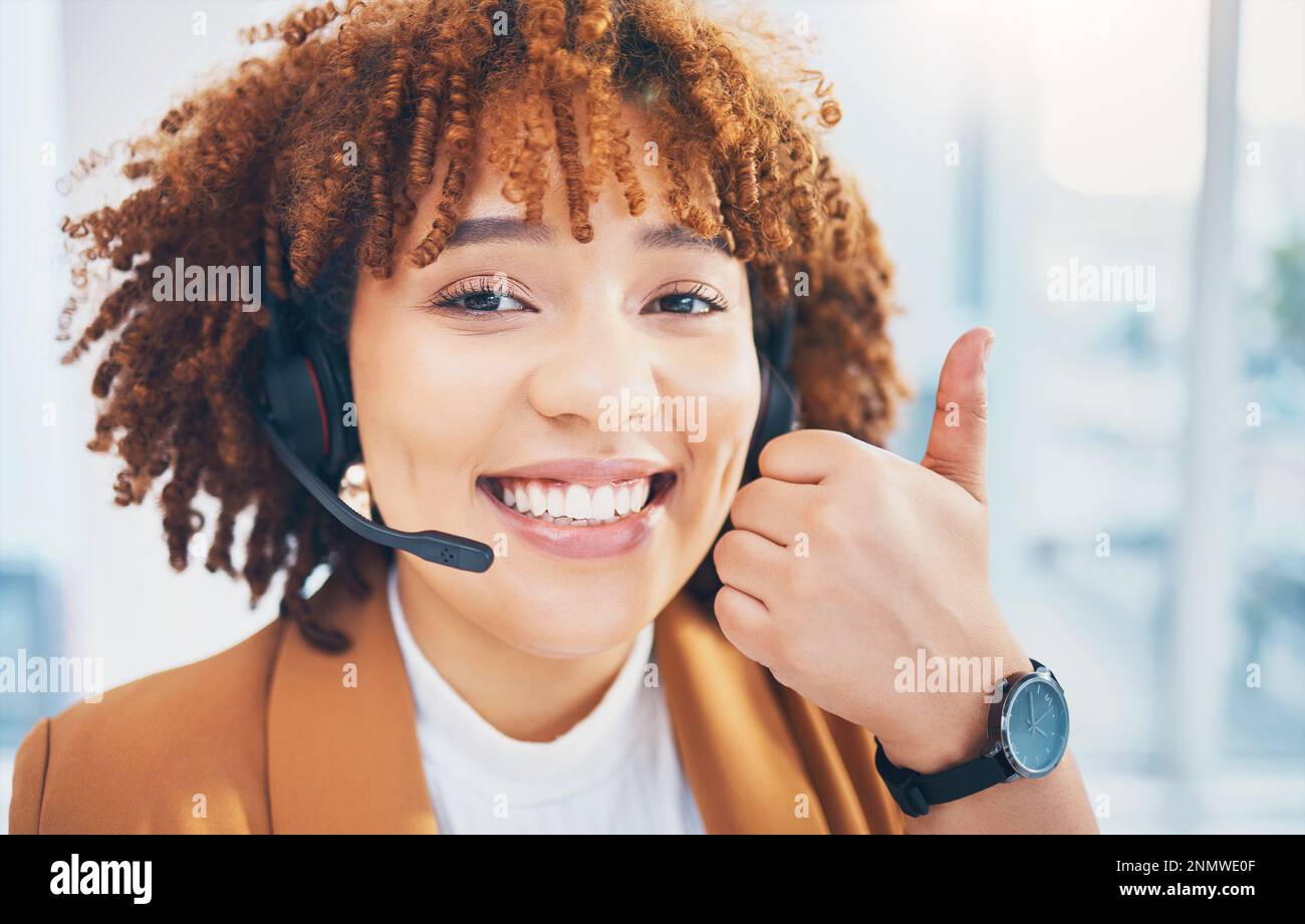 Call center girl thumbs up hi-res stock photography and images - Alamy