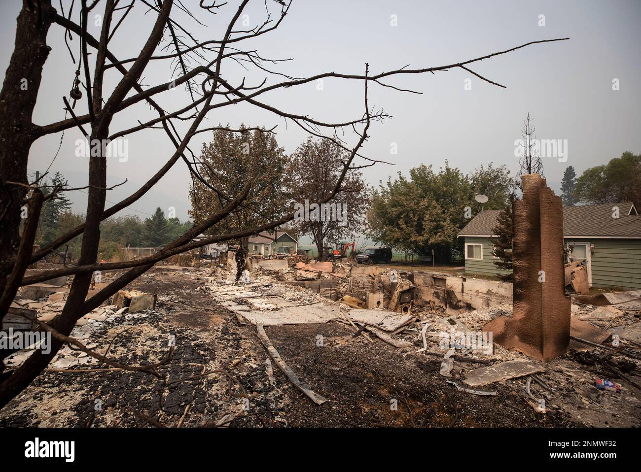 The remains of a house destroyed by the White Rock Lake wildfire is ...