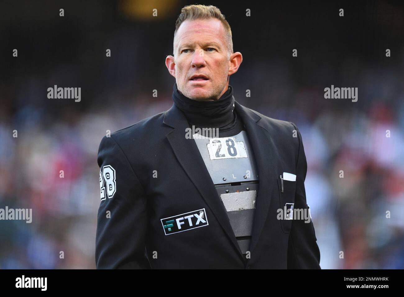 SAN FRANCISCO, CA - JULY 28: Home plate umpire Jim Wolf looks on during ...