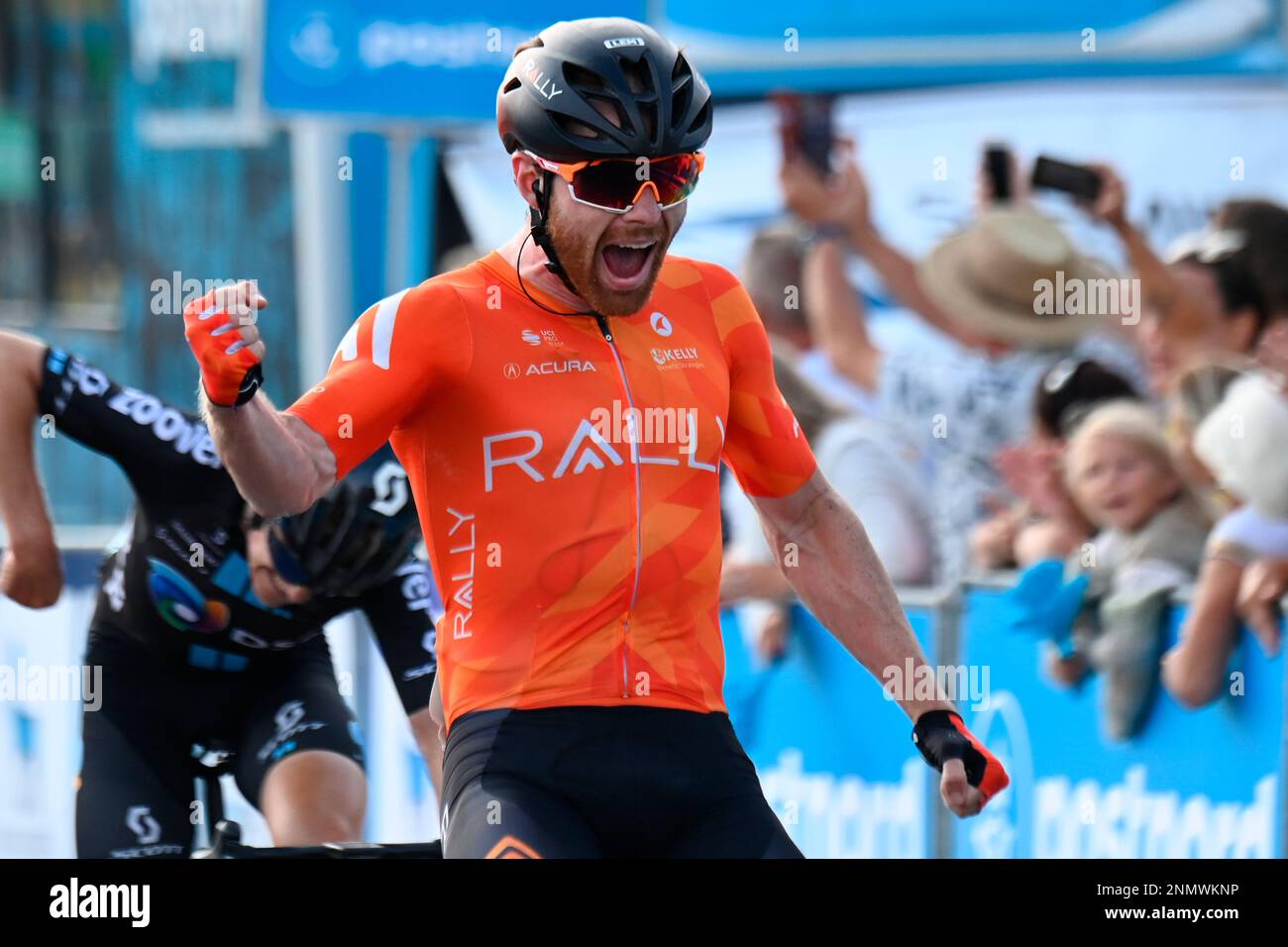 Colin Joyce of the United States crosses the finish line to win the ...