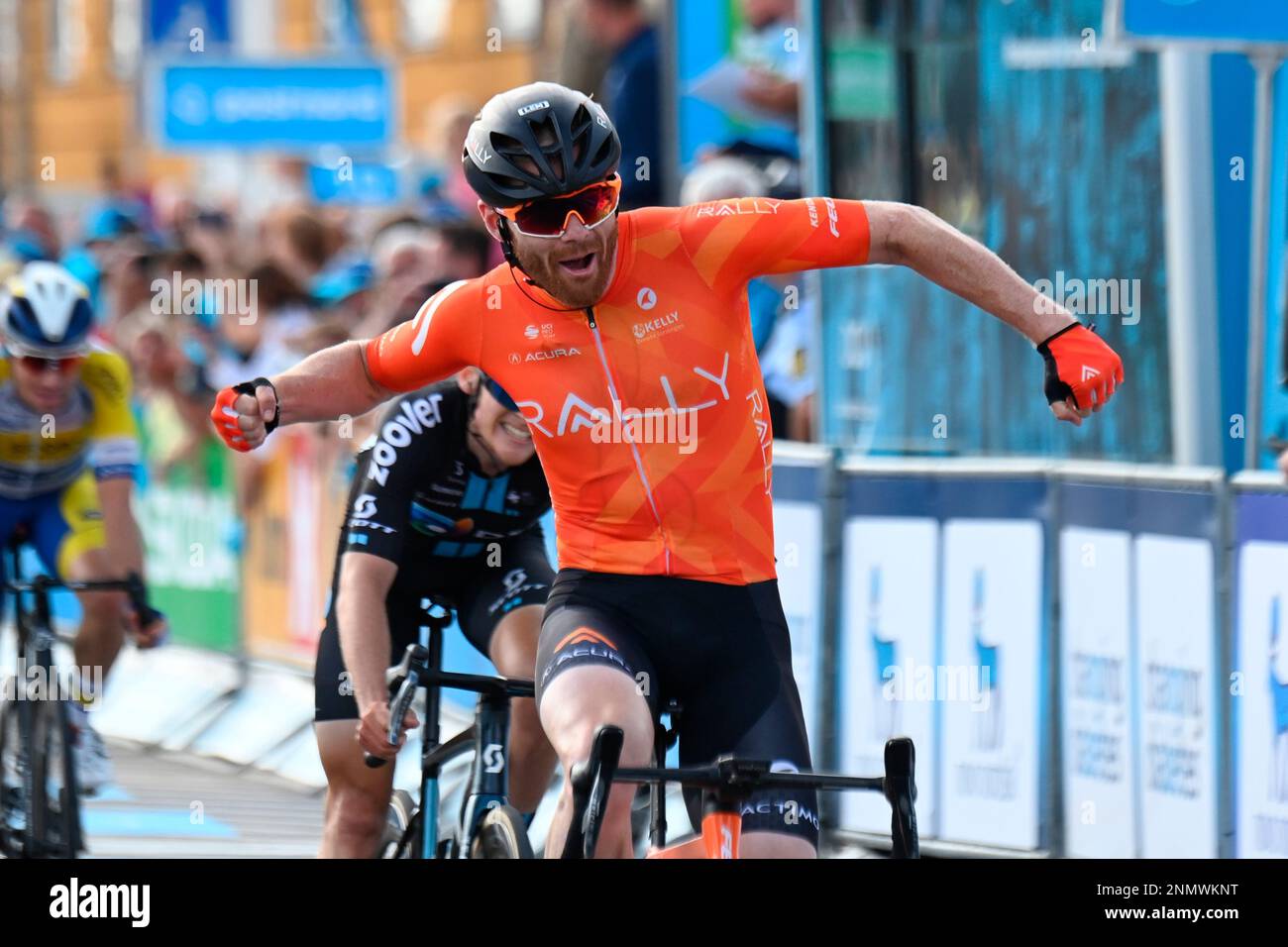 Colin Joyce of the United States crosses the finish line to win the ...