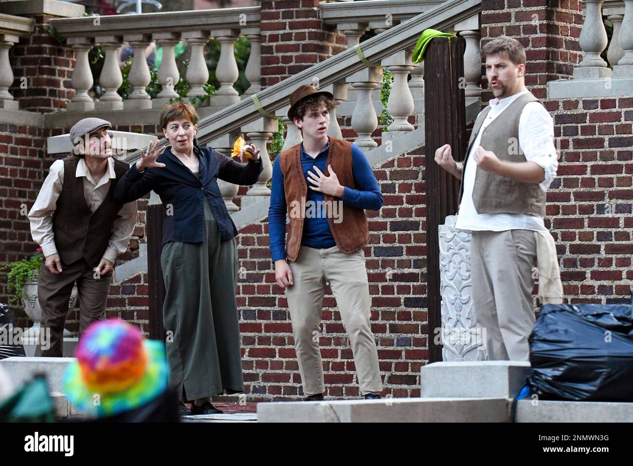 The Mechanicals in a scene, from left, Gregor Gunelson as Tom Snout ...
