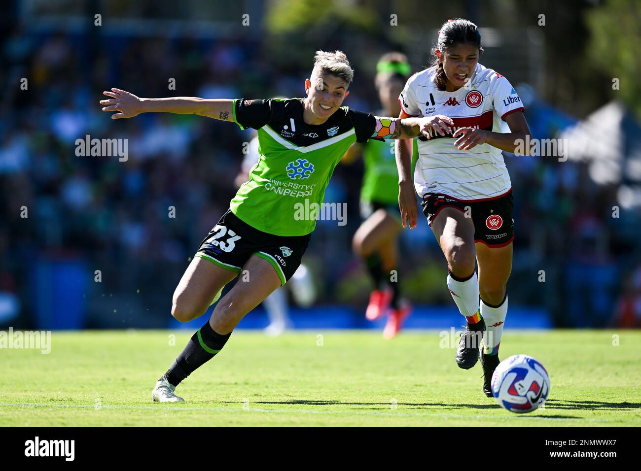 Michelle Heyman of Canberra United fights for the ball with Alexia ...