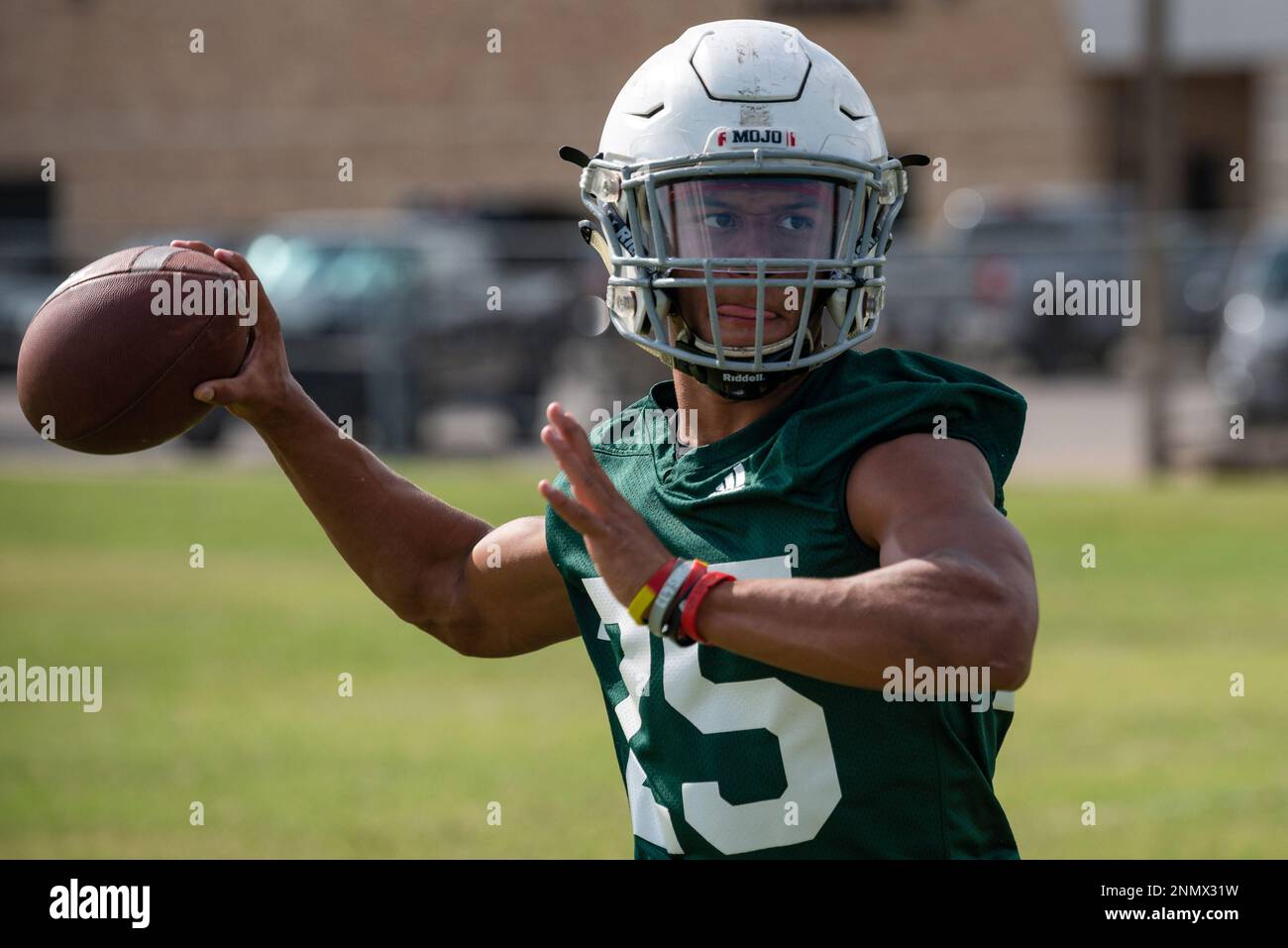 Permian High School quarterback Rodney Hall prepares to throw the ball ...