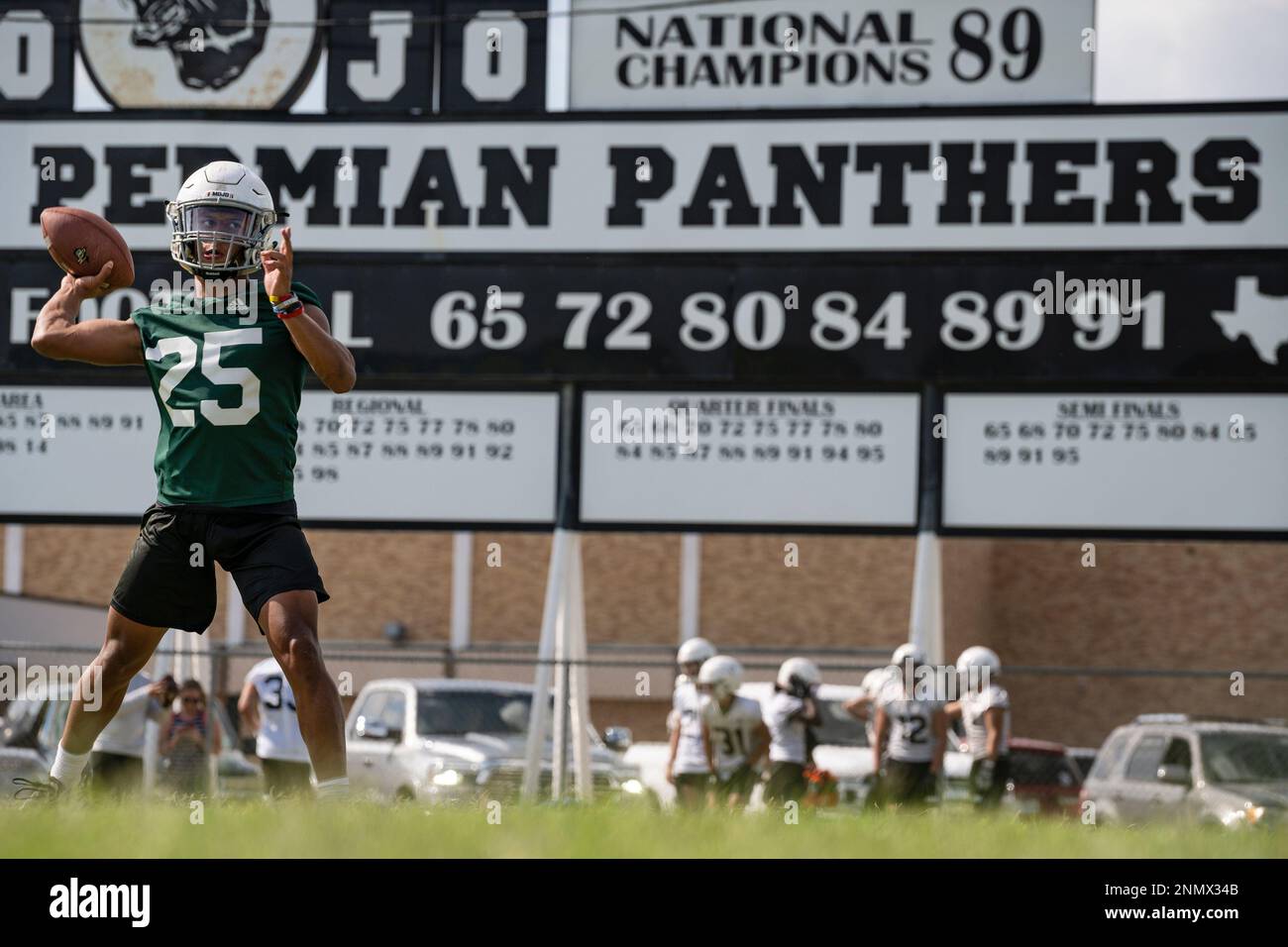 Permian High School quarterback Rodney Hall (25) prepares to throw the ...