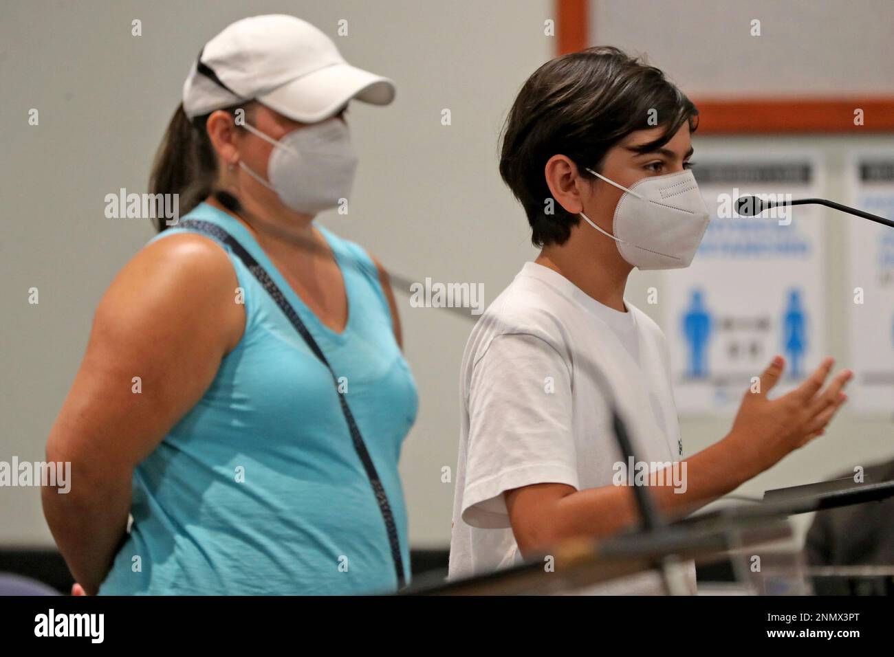 Sebastian Godoy, 13, of Pembroke Pines, with his mother, Gabriela ...