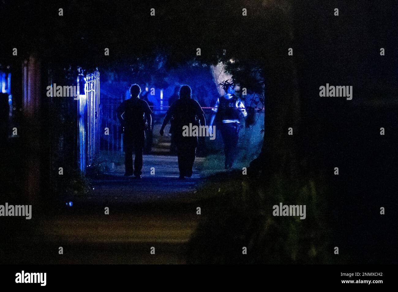 Chicago police work the scene where two police officers where shot ...