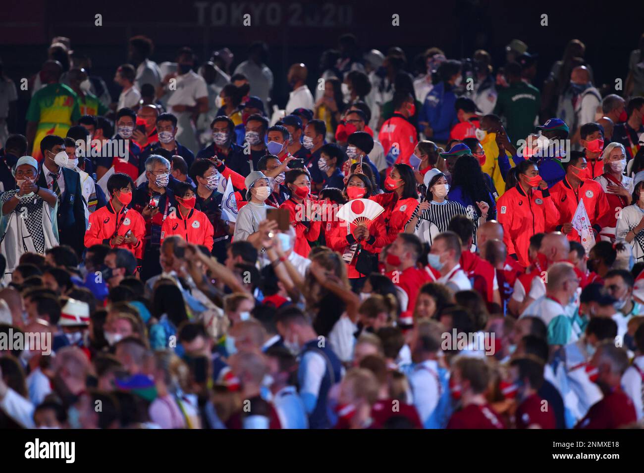 Athletes gather in the Tokyo Olympic Closing Ceremony at the National ...