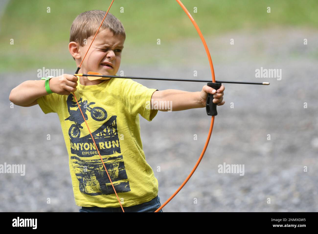 Tristan Luckenbill, of Hamburg, Pa., gives his archery skills a try at ...