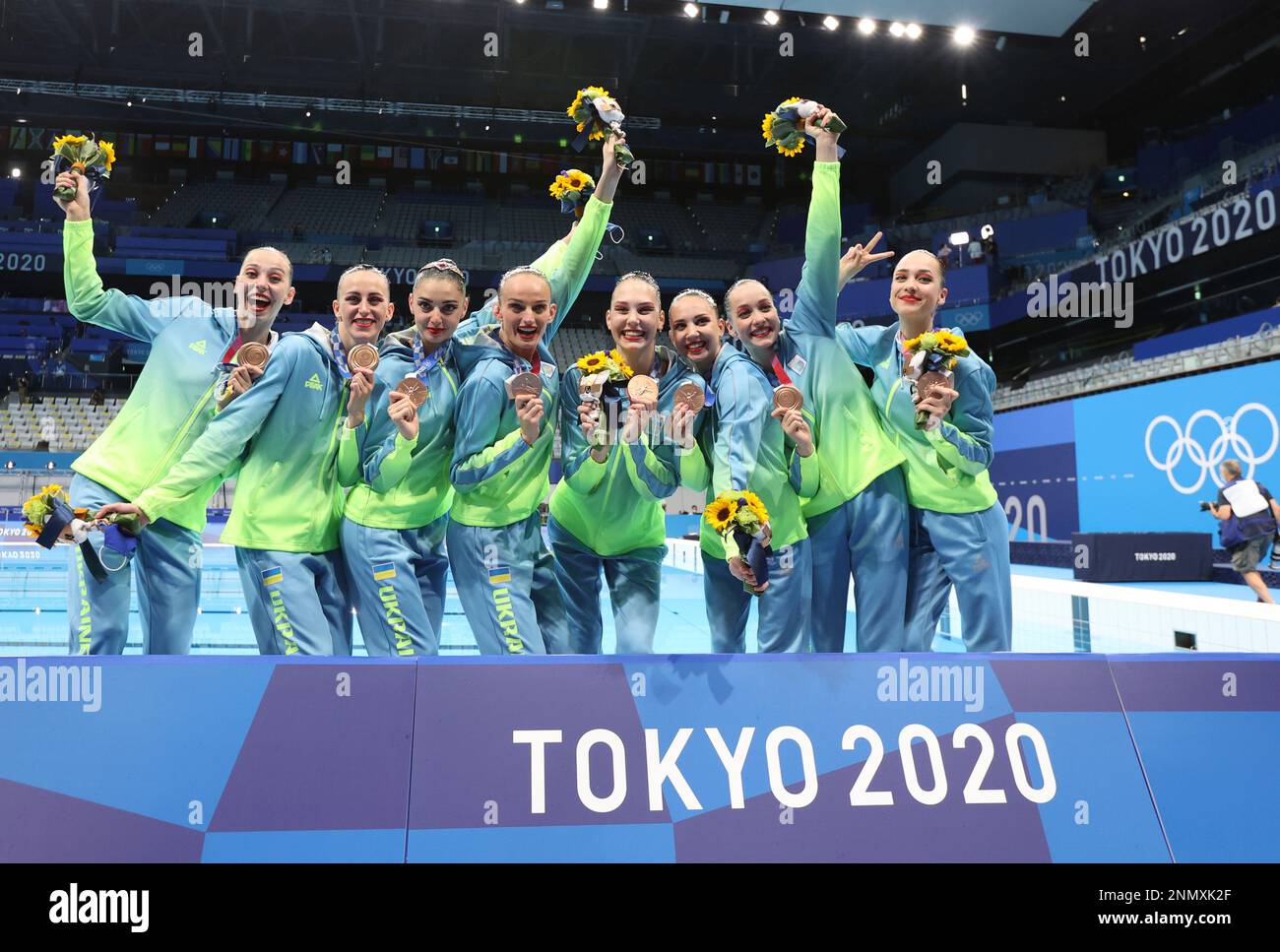 Ukraine's team pose for a photo following a victory ceremony of the ...