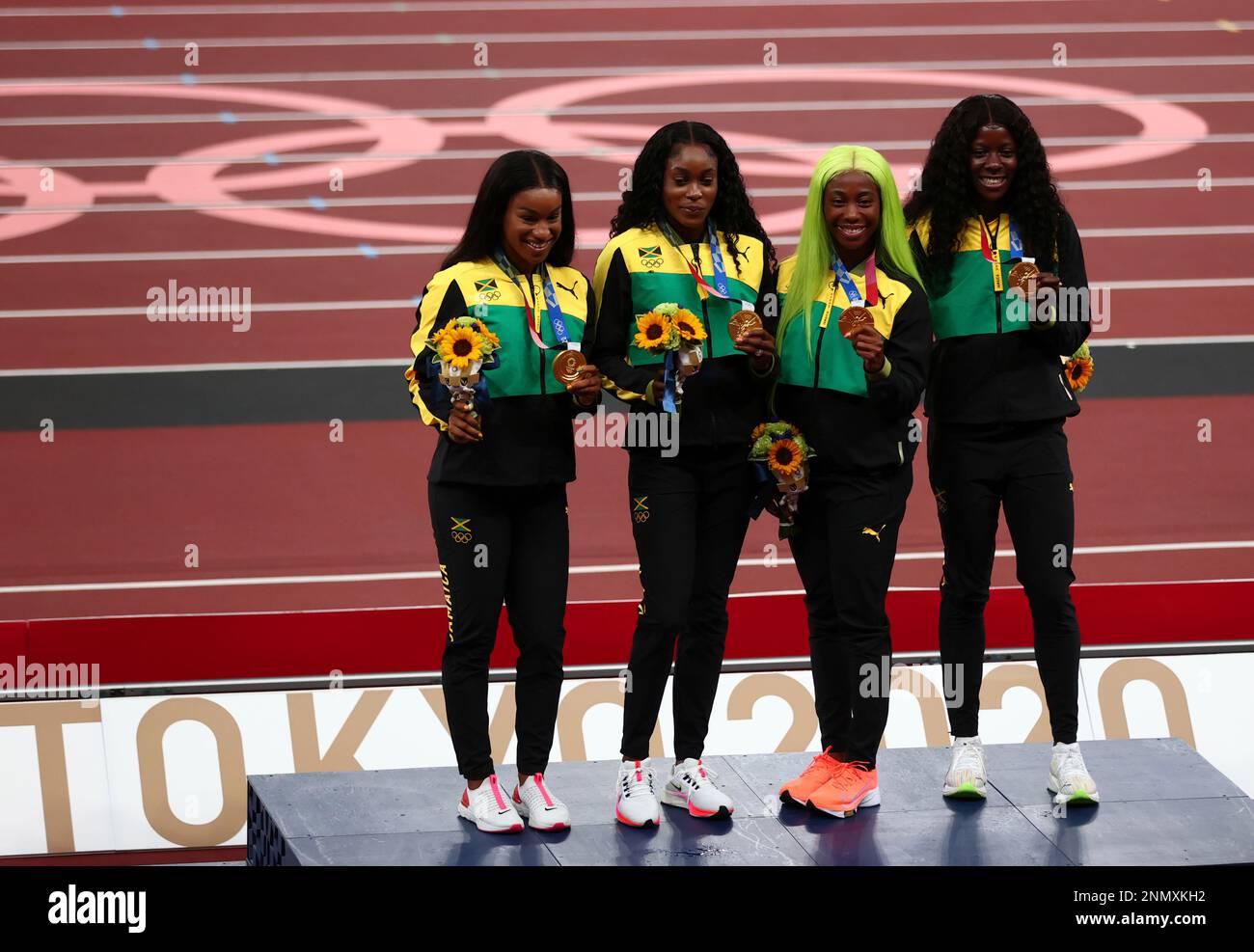Members of Jamaica athletes celebrate during an award ceremony of the ...