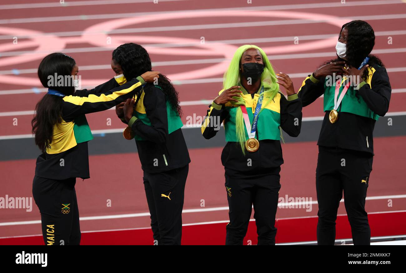 Members of Jamaica athletes celebrate during an award ceremony of the ...