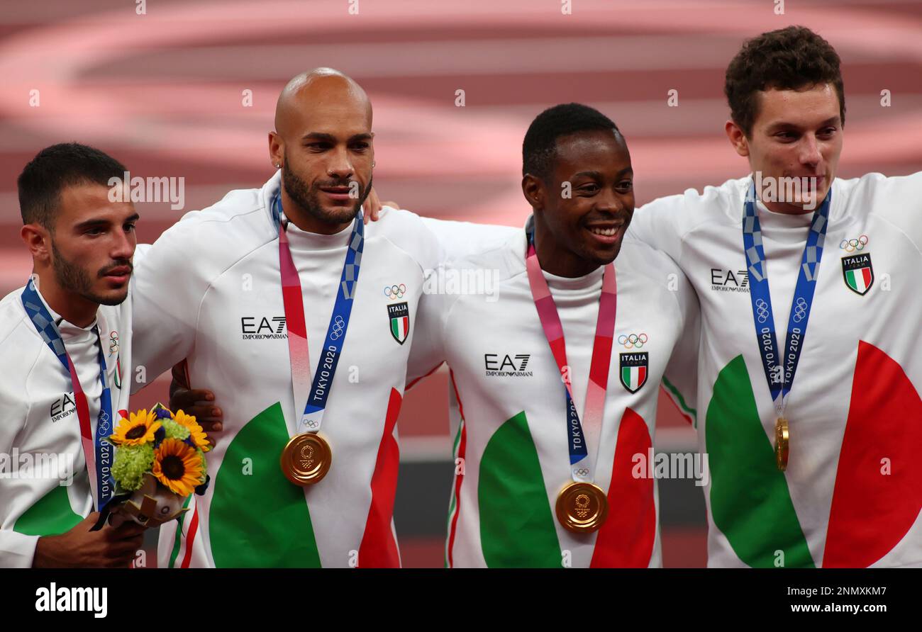 Members of Italy athletes celebrate during an award ceremony of the Men ...