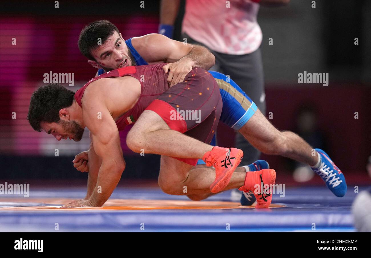 RASHIDOV Gadzhimurad (blue) of ROC holds down during the Wrestling Men ...