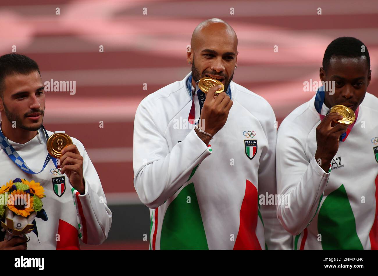 Members of Italy athletes celebrate during an award ceremony of the Men ...
