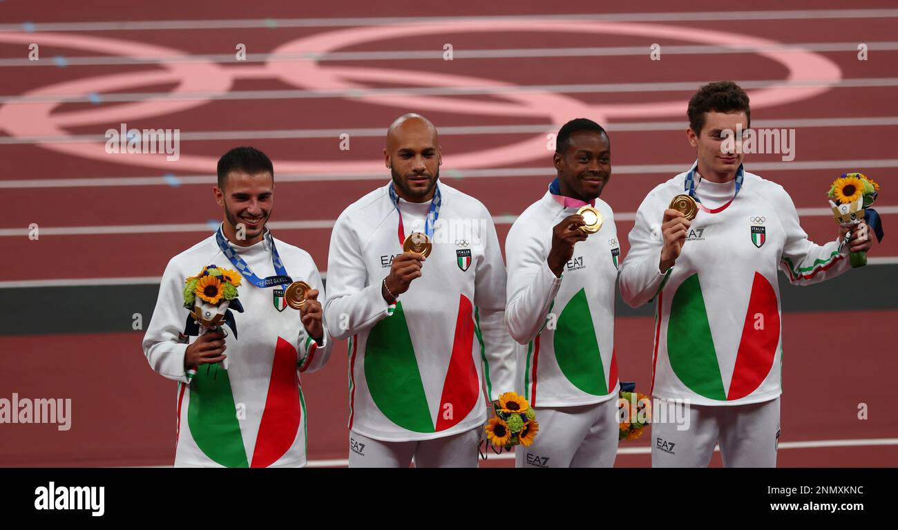 Members of Italy athletes celebrate during an award ceremony of the Men ...