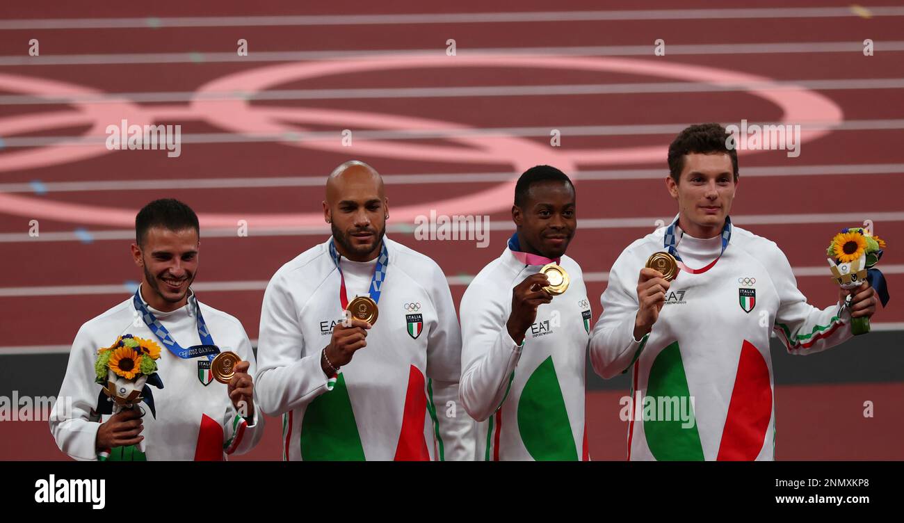 Members of Italy athletes celebrate during an award ceremony of the Men ...