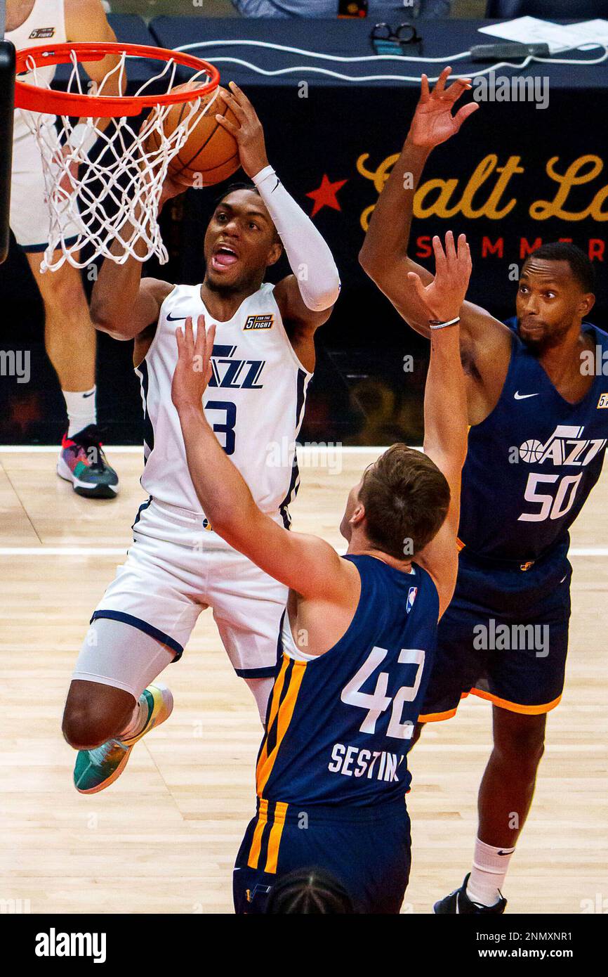 Utah Jazz White forward Trent Forrest (3) shoots, with Utah Jazz Blue ...