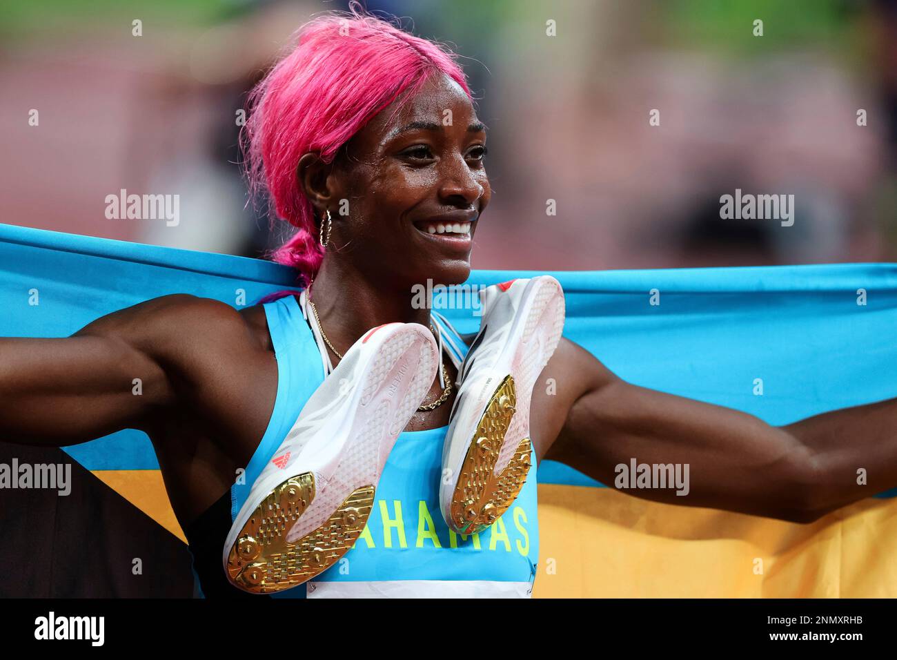TOKYO, JAPAN - AUGUST 06: Shaunae Miller-Uibo of Team Bahamas holds her ...
