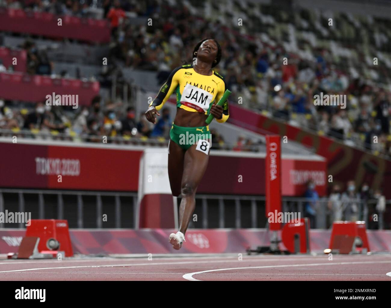 Jamaica's team WILLIAMS Briana (8 lane) crosses the finish line during the Women's ' 4 x100 ...