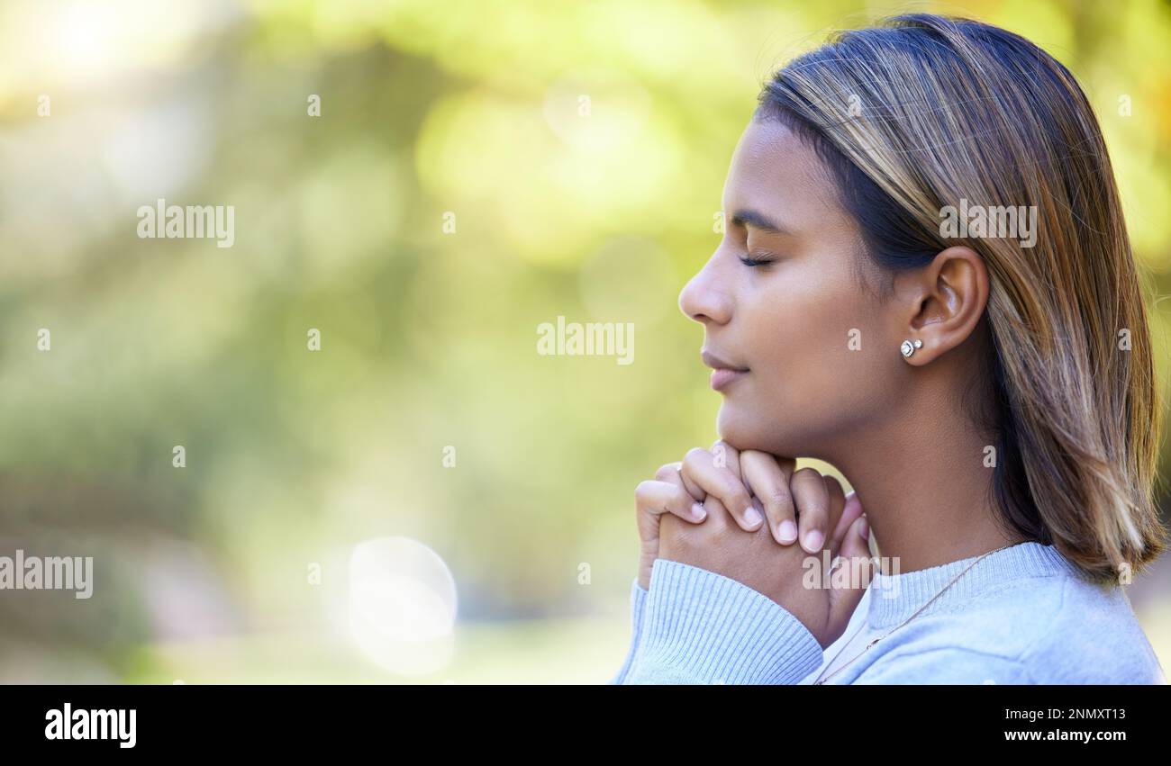 Prayer, peace and worship with woman in nature and mockup for God ...