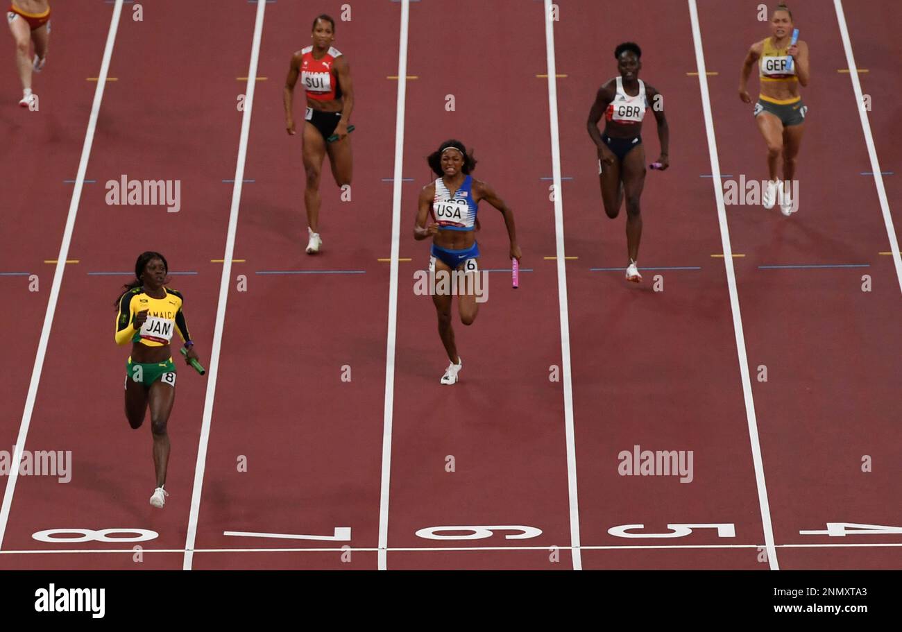 Jamaica's team WILLIAMS Briana ( L, 8 lane) crosses the finish line during the Women's ' 4 x100 ...