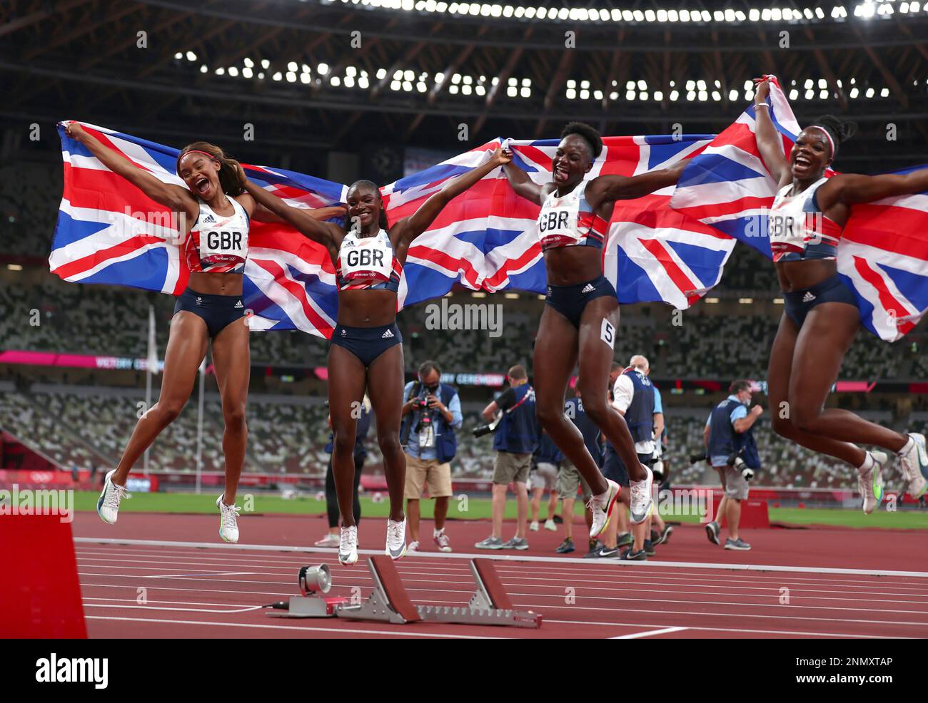 Great Britains' team memebers jump for joy after capturing the bronze ...