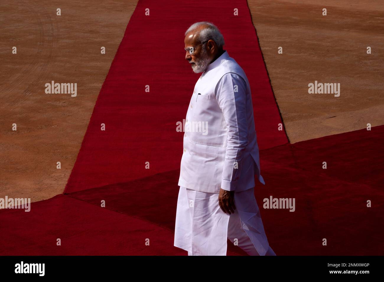 Indian Prime Minister Narendra Modi walks to receive German Chancellor Olaf Scholz, for latter's ...