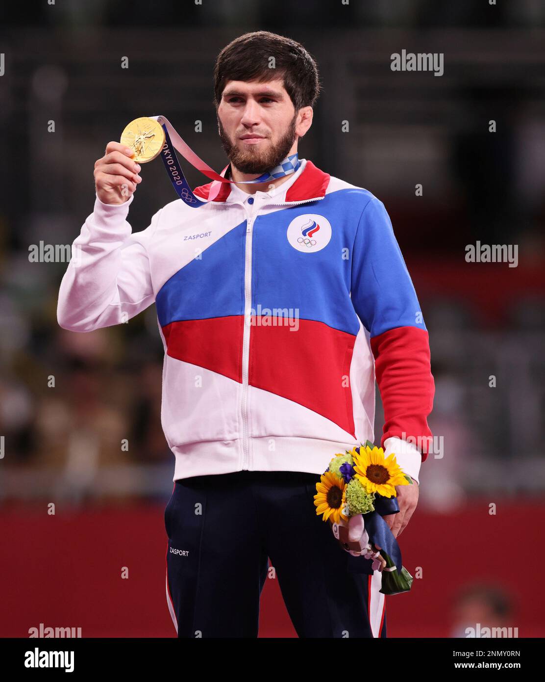 ROC's UGUEV Zavur attends a victory ceremony after winning the ...