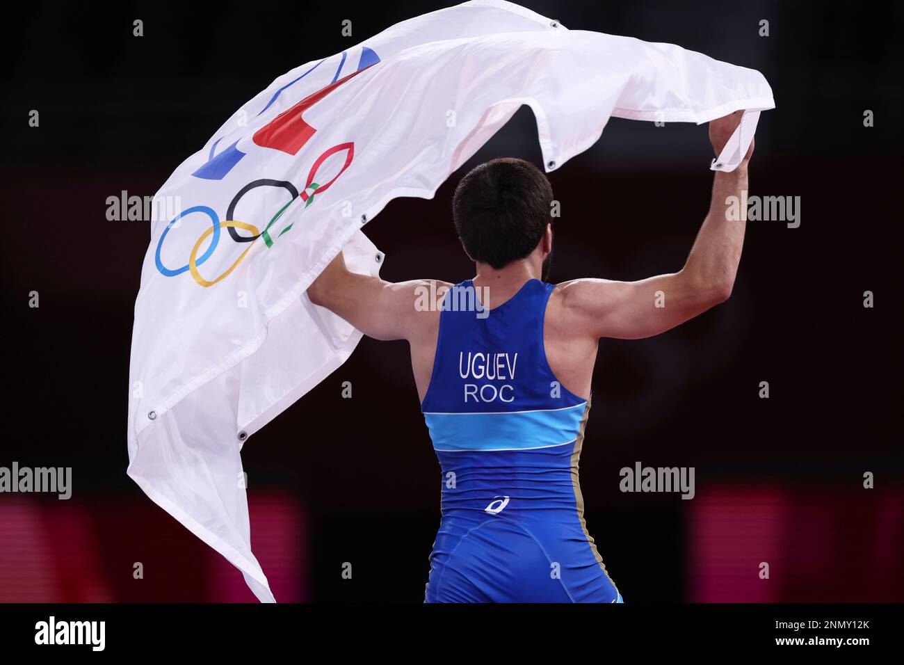 ROC's UGUEV Zavur celebrates after winning the Wrestling Men's ...