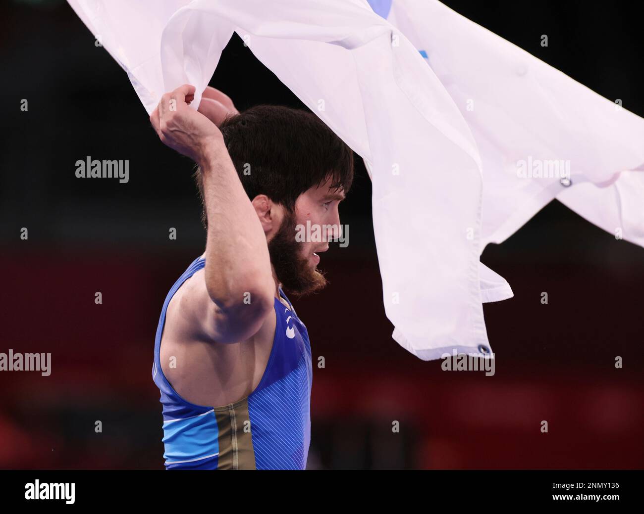 ROC's UGUEV Zavur celebrates after winning the Wrestling Men's ...