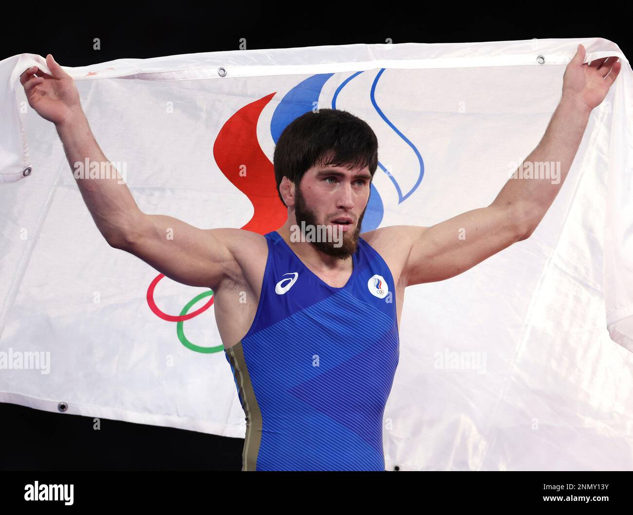 ROC's UGUEV Zavur celebrates after winning the Wrestling Men's ...