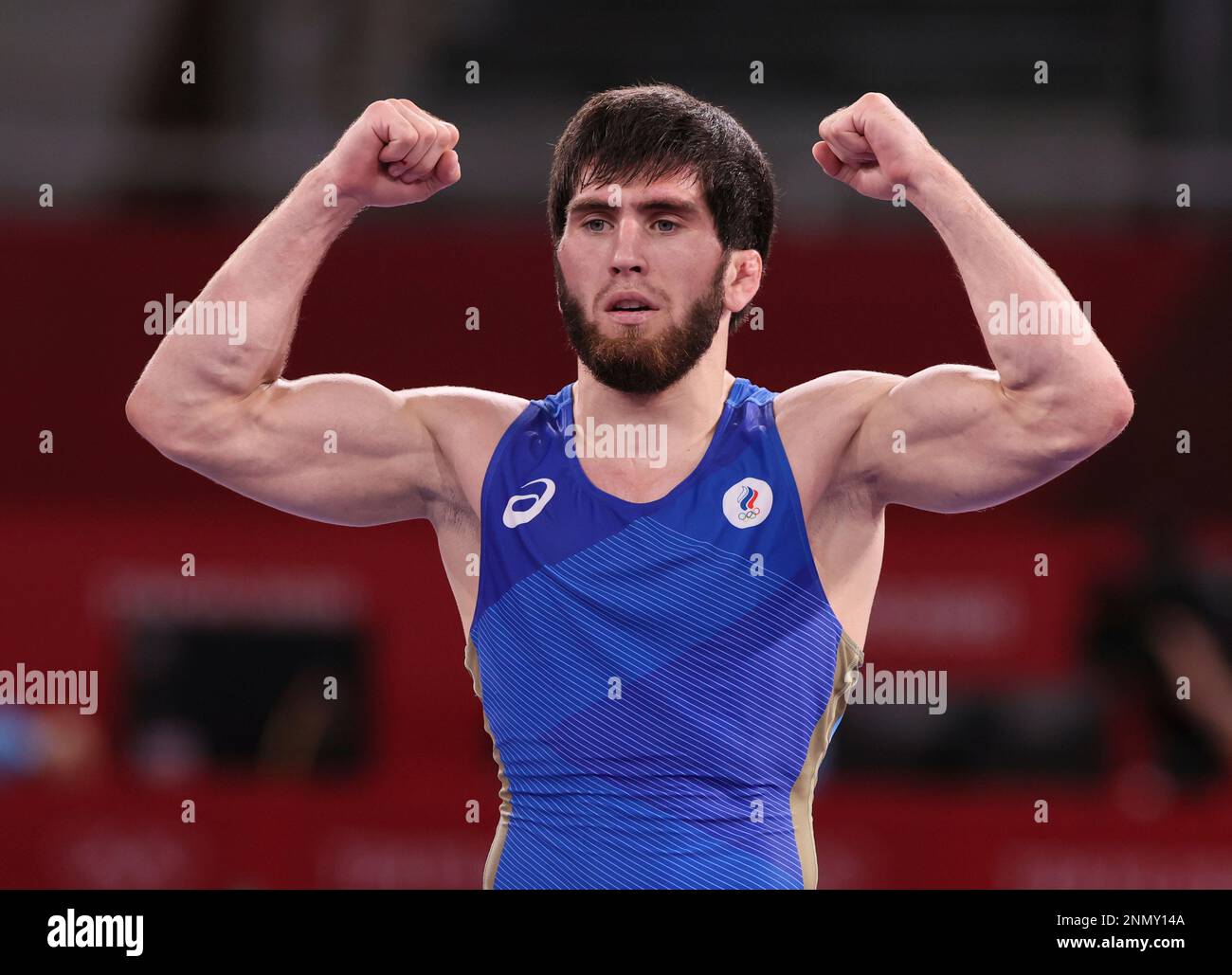 ROC's UGUEV Zavur celebrates after winning the Wrestling Men's ...
