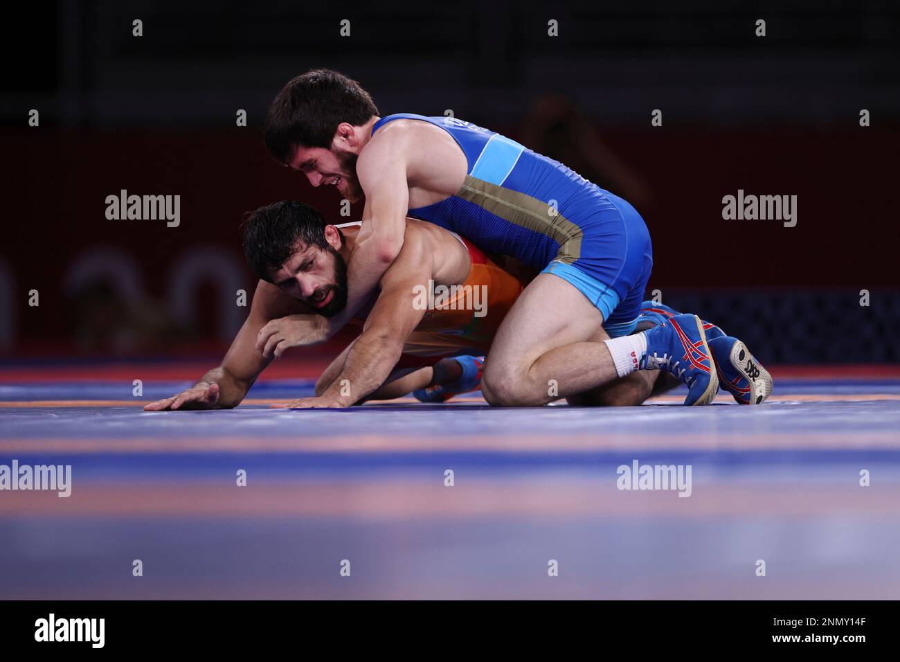 India's RAVI Kumar (red) and ROC's UGUEV Zavur compete during Wrestling ...