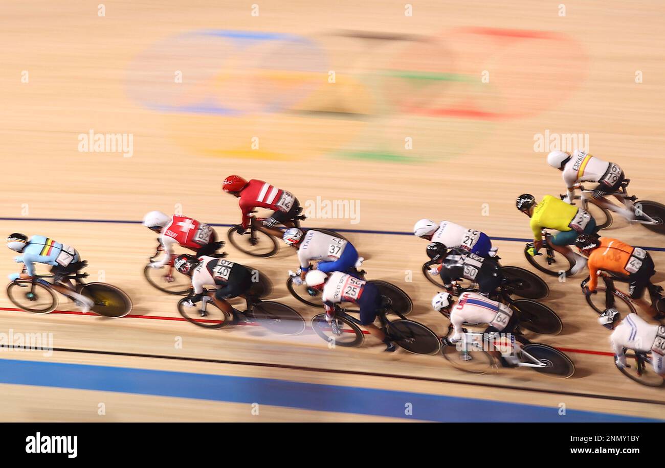 Athletes compete in the Cycling Track Men's Omnium Elimination Race of ...
