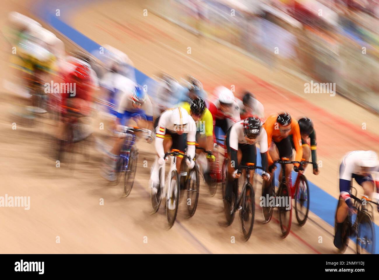 Athletes compete in the Cycling Track Men's Omnium Elimination Race of ...