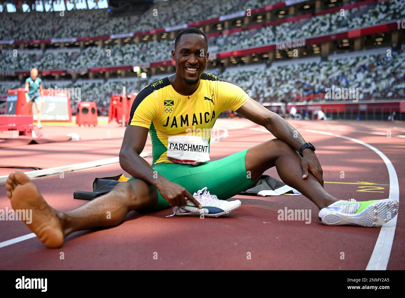Hansle Parchment, of Jamaica poses after winning the gold medal in the ...