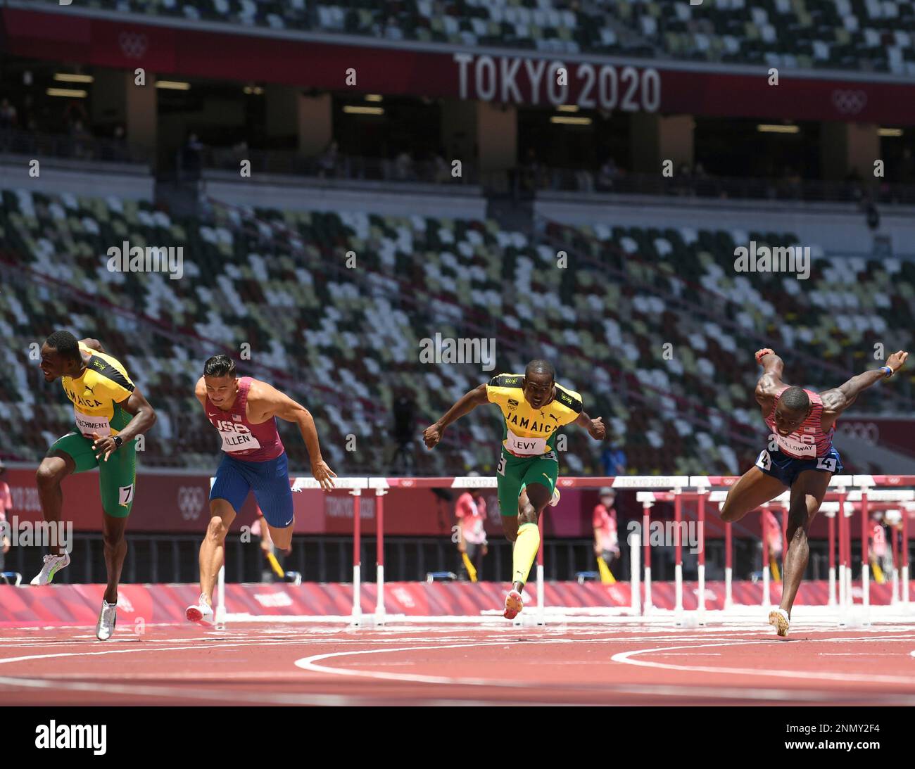 PARCHMENT Hansle (L, 7) of Jamaica crosses the finish line during the ...